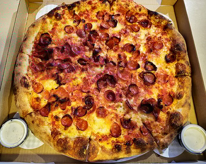 Pepperoni that curls into crispy cups, holding tiny pools of savory oil—this is pizza engineering at its finest.