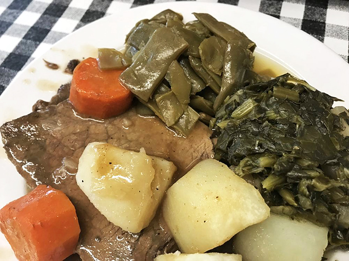 Behold the pot roast—fork-tender beef swimming in gravy that could make a vegetarian question their life choices.