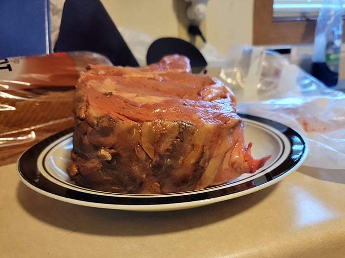 Behold the star of the show – prime rib so perfectly roasted it practically poses for its close-up. This isn't dinner; it's a masterpiece.