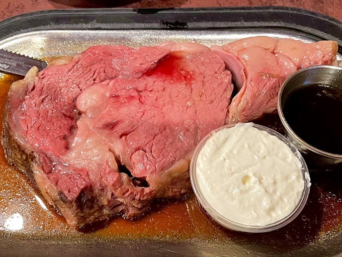Behold the star of the show – prime rib so perfectly pink it should have its own Instagram account. That horseradish cream is the perfect dance partner.
