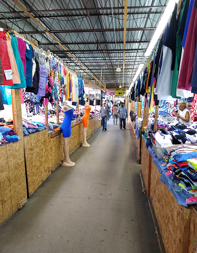 Down the rabbit hole of retail therapy, where clothing racks create a colorful tunnel of possibilities and second chances.