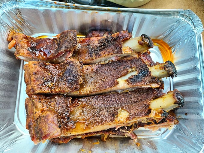 These ribs don't just fall off the bone—they practically leap into your mouth with a perfect bark that's the BBQ equivalent of a crisp autumn day.