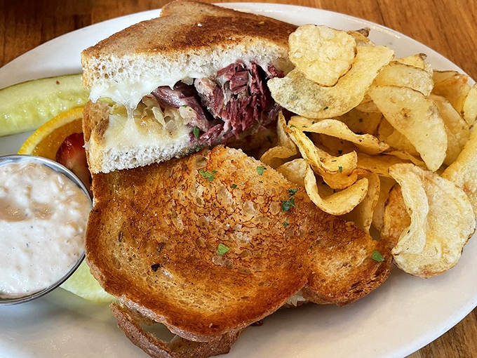Behold the Reuben in all its glory—house-corned beef piled high, Swiss cheese cascading down the sides. This isn't lunch; it's an edible love letter to Cleveland.