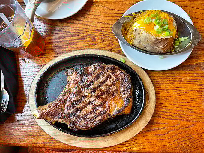 That perfect char on the outside, that juicy tenderness within—this sizzling ribeye and loaded baked potato duo performs the ultimate comfort food symphony.