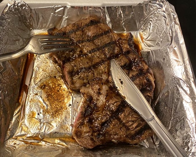 This isn't just a steak—it's a masterpiece of marbling that makes meat lovers weak in the knees. Fork and knife required, napkins strongly encouraged.