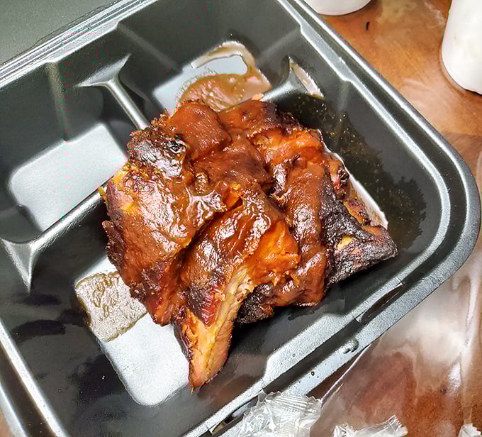 These ribs aren't just falling off the bone—they're practically jumping into your mouth. The glossy bark tells you everything you need to know.