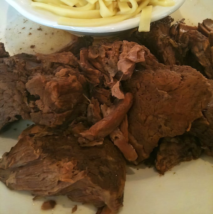 Behold the star attraction: roast beef so tender it practically surrenders to your fork. This isn't just meat—it's a masterclass in patience and technique.