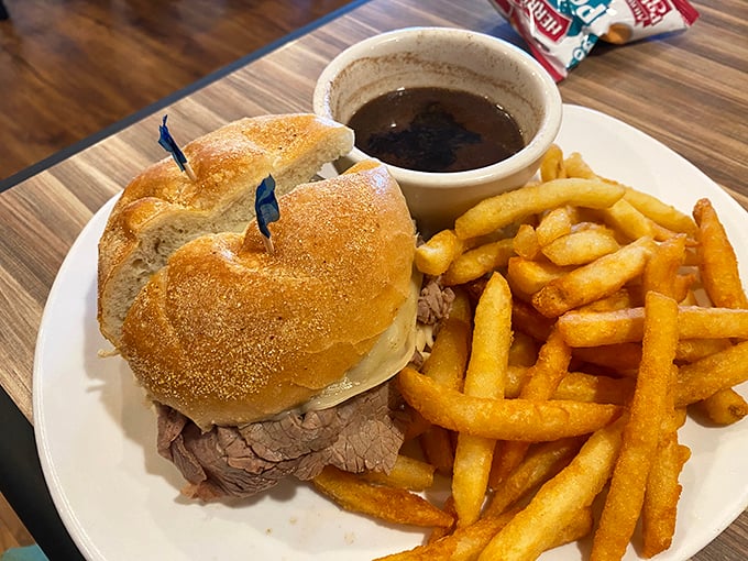 Behold the roast beef sandwich that launched a thousand return visits, served with au jus perfection.
