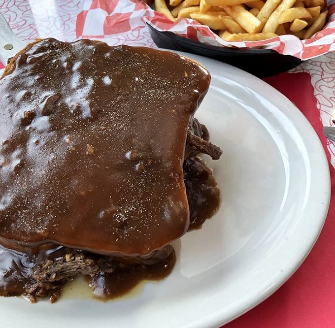 Not all heroes wear capes—some come smothered in gravy. This roast beef sandwich demands both hands and possibly a moment of silent appreciation.