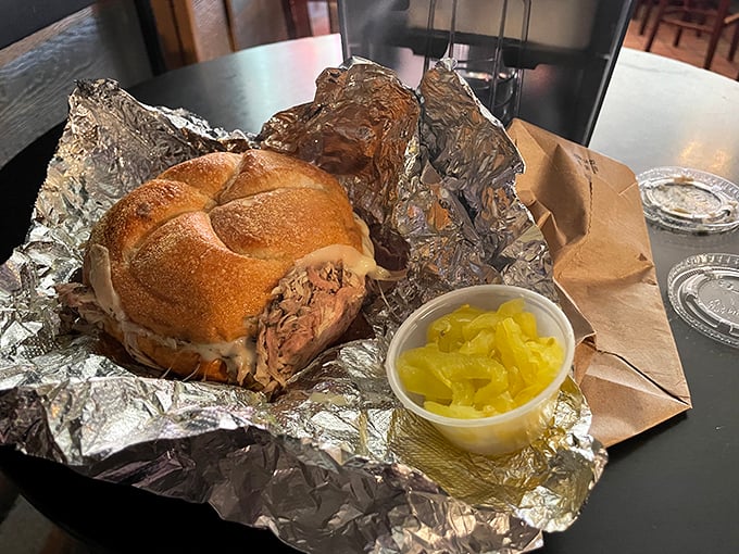 Foil-wrapped perfection waiting to be unveiled. This sandwich doesn't need Instagram filters—it's been making mouths water since before social media existed.