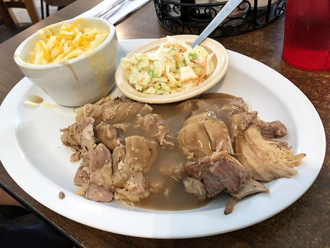 This roast pork isn't just tender, it's having an identity crisis because it falls apart faster than my plans to start that diet tomorrow.