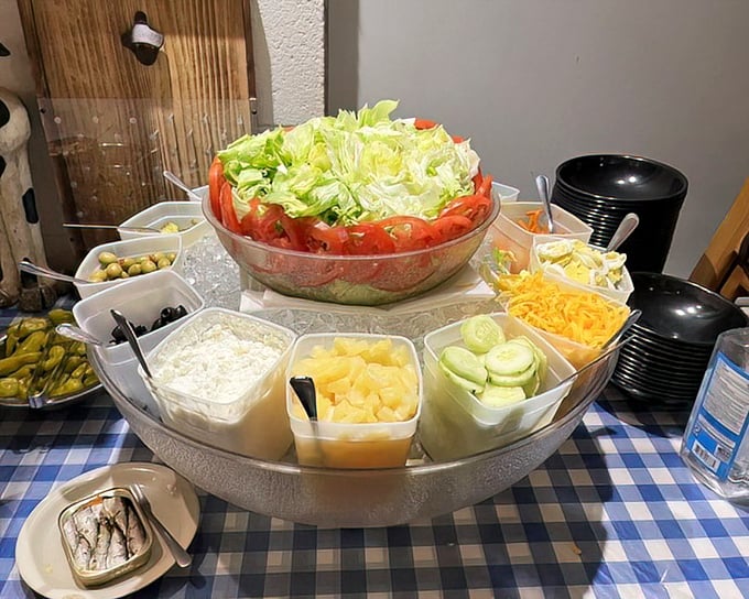 This isn't just a salad bar—it's a prelude to the main event. Fresh ingredients standing at attention, waiting to prepare your palate for the beef bonanza to come.
