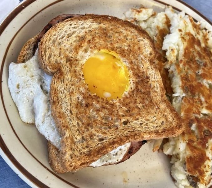 Mickey's "One Eyed Jack" sandwich proves that sometimes the simplest pleasures—toast, egg, and ham—create the most satisfying symphony on a plate.