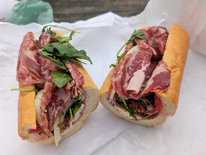 This isn't just a sandwich—it's architecture with prosciutto. Look at those layers! The arugula adds just the right peppery counterpoint.