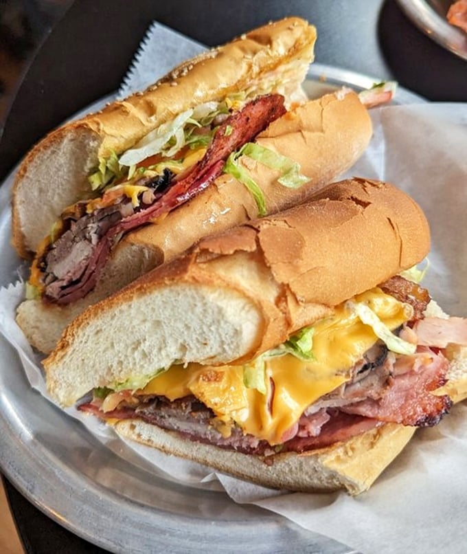 Architectural masterpieces aren't just found in museums—they're stacked between bread here, where layers of meat and cheese create edible sculptures worth traveling for.