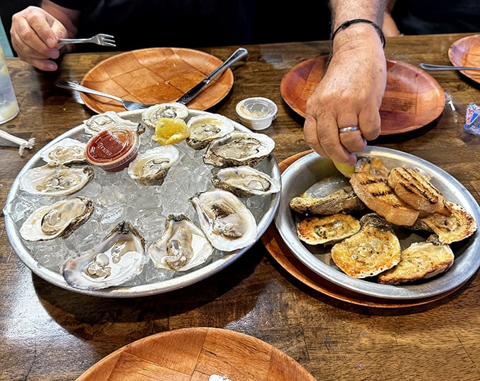 Fresh oysters served on ice with grilled bread – proof that sometimes the ocean's finest gifts need nothing more than a squeeze of lemon and good company.