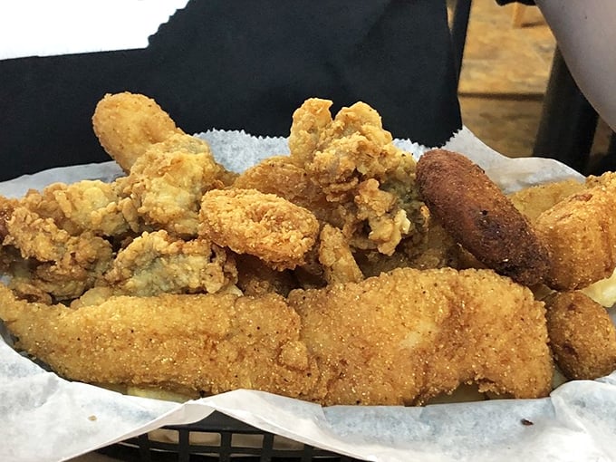 Golden-brown perfection piled high – this is what happens when someone actually cares about their cornmeal-to-fish ratio.