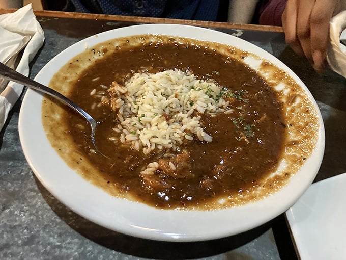 Dark as midnight in the bayou, this gumbo's got more depth than your average philosophy professor.