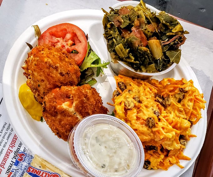 Behold the platter that launched a thousand road trips—golden fried perfection meets garden-fresh greens.