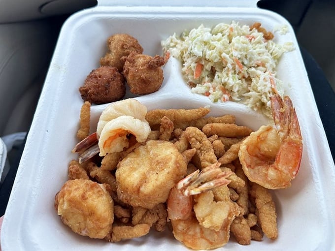 A seafood platter that makes you question why you ever eat anything else. Crispy, golden treasures from the deep with coleslaw for balance.