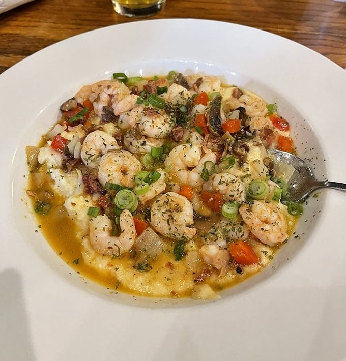 This isn't just Shrimp & Grits—it's a Southern symphony where plump local shrimp dance with creamy grits in perfect harmony.