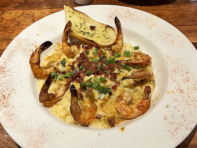 These shrimp and grits aren't just a meal—they're a Southern hug on a plate. Bacon bits and green onions add the perfect finishing touch.