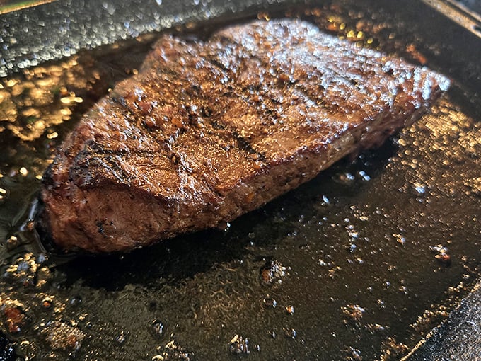 Behold the sirloin in all its glistening glory – a masterpiece of meat that makes vegetarians question their life choices.