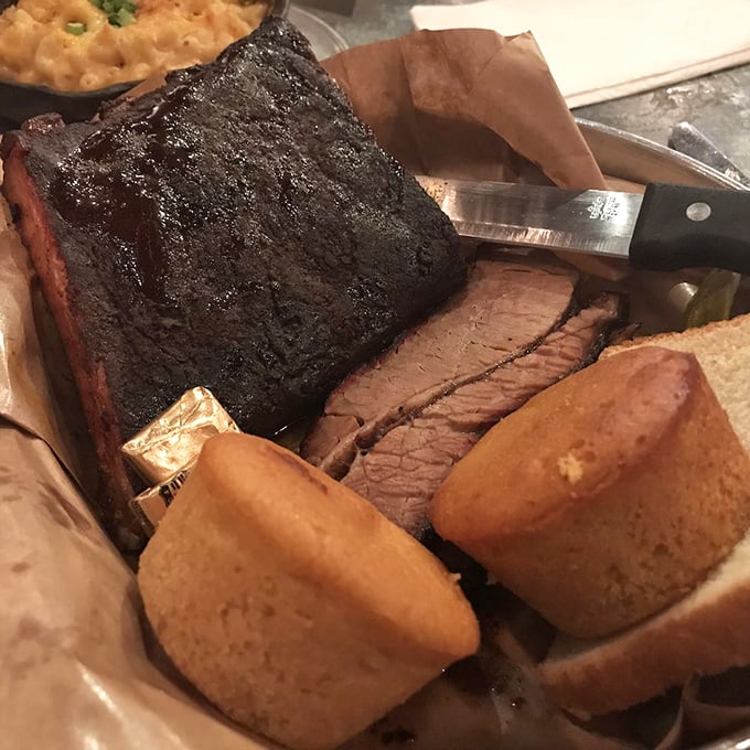 Behold the brisket—sporting a smoke ring so perfect it could win Olympic gold in the Barbecue Games.