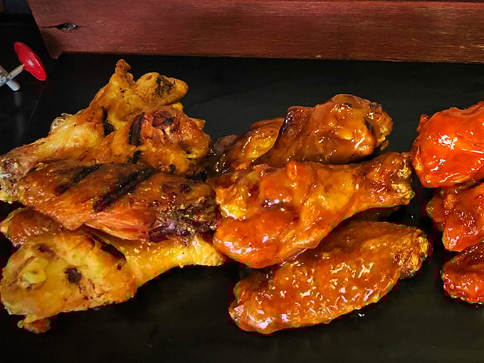 Behold the smoked wing lineup: various sauces coating perfectly cooked poultry that'll redefine your wing standards forever.