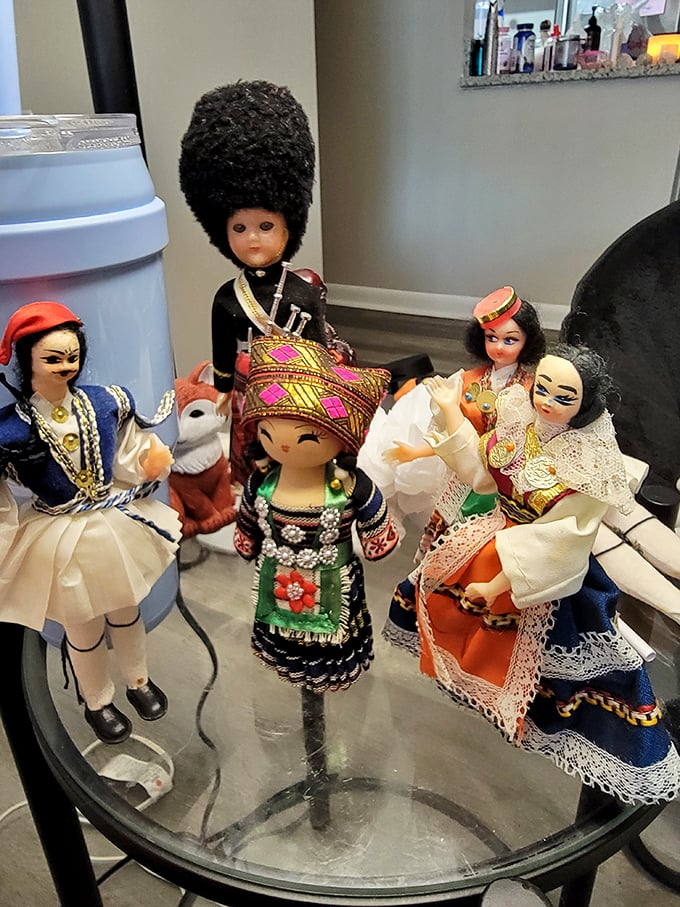 Cultural ambassadors in miniature form, these international dolls stand at attention, ready to bring worldly charm to someone's curio cabinet.