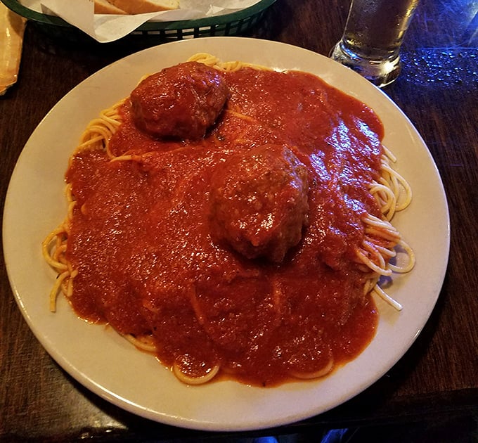 Behold the spaghetti that makes grown adults weep tears of marinara-scented joy – resistance is futile and unnecessary.