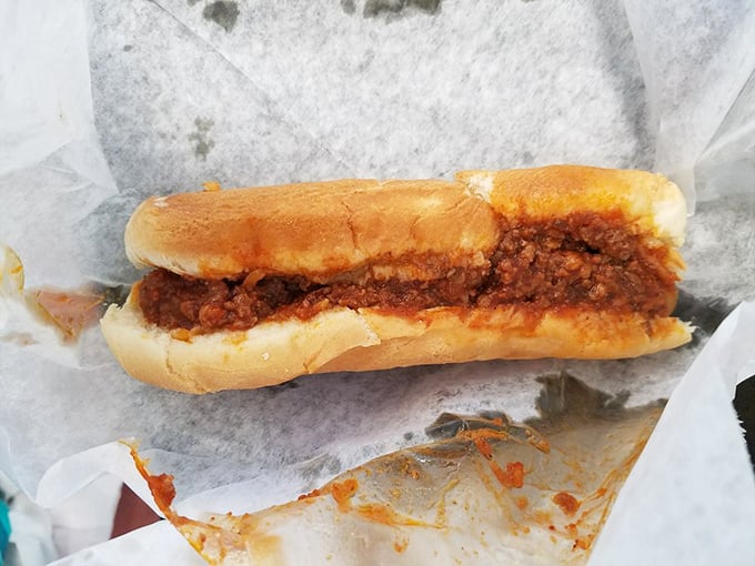 Meet the star of the show! The Spanish Dog comes dressed in its signature sauce—a rich, slightly sweet concoction that's worth every mile of your journey.