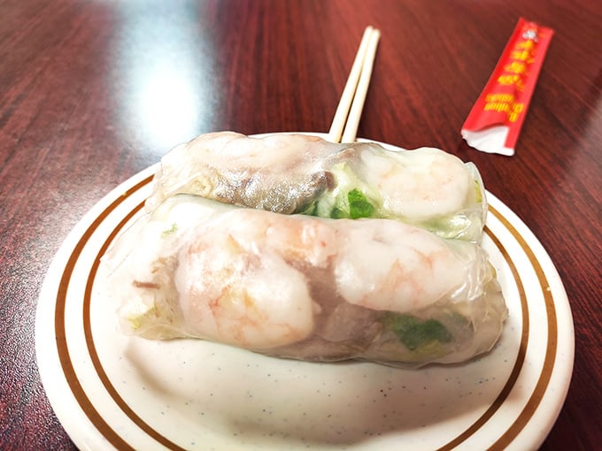 These translucent spring rolls reveal plump shrimp through their delicate rice paper wrappers – edible stained glass windows to flavor paradise.