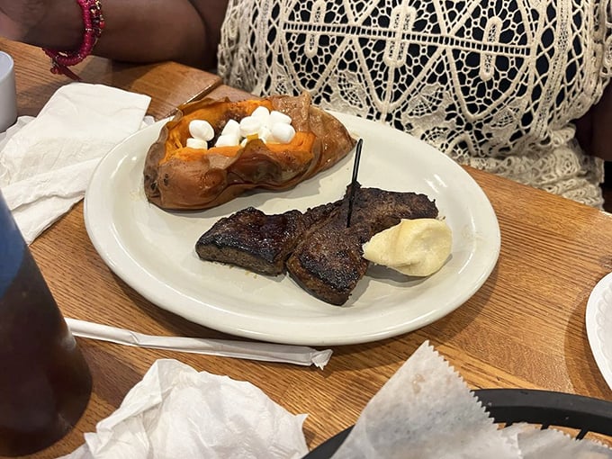 Steak and sweet potato—a marriage made in comfort food heaven. That marshmallow-topped spud might just steal the spotlight from its beefy companion.