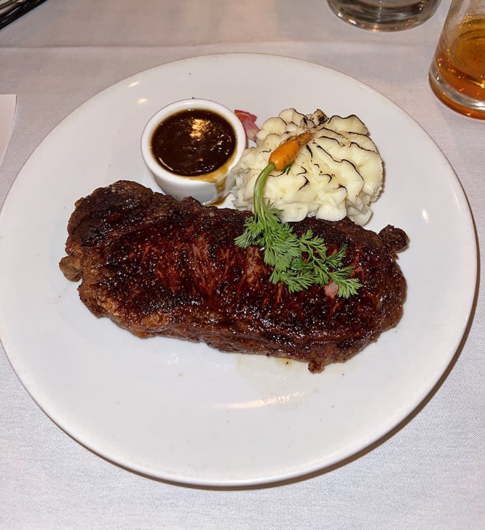 A perfectly seared steak that doesn't need fancy introductions—just a moment of silent appreciation before the first heavenly bite.