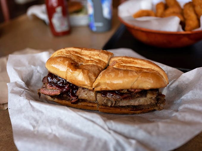 Behold the sandwich that ruins all other sandwiches – gloriously smoky and unapologetically messy.