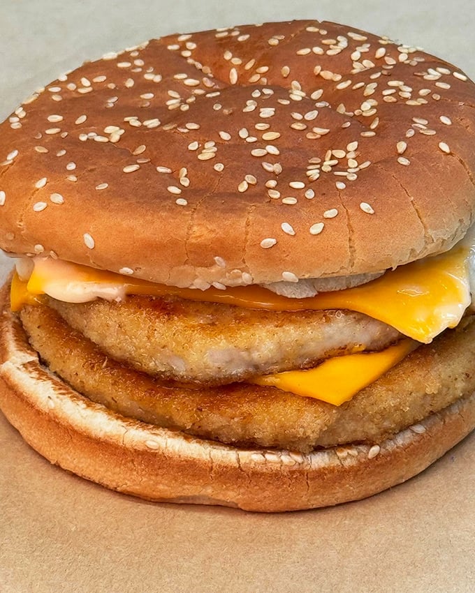 This isn't just a turkey burger—it's edible architecture, with golden-brown patties and melty cheese that make you question why you ever bothered with beef.