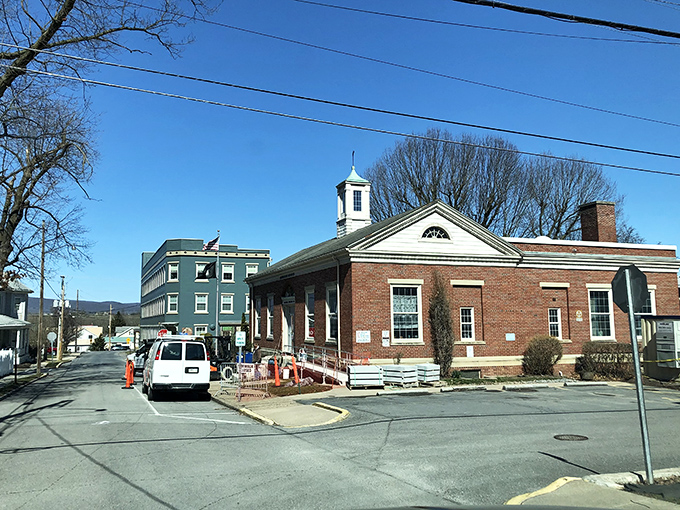 Small-town civic architecture at its finest—this brick building has likely witnessed countless community gatherings, town meetings, and the everyday rhythm of Mifflinburg life.