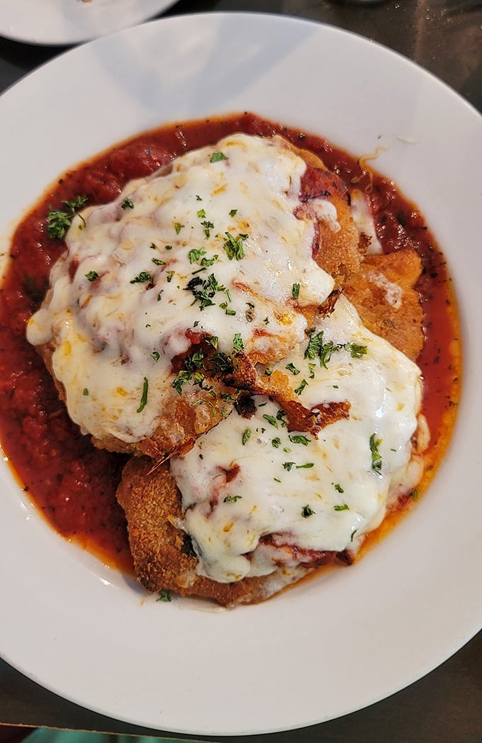 Behold the star of the show! This Veal Parmigiano isn't just dinner—it's a masterpiece of crispy, saucy, cheesy perfection that would make angels weep.