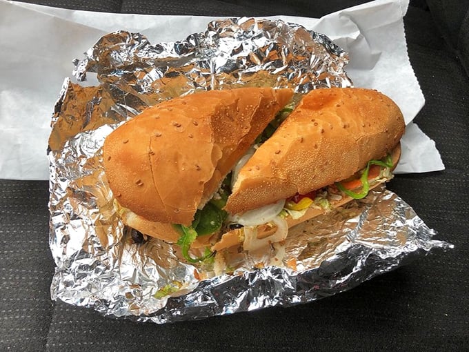 This sub isn't just a sandwich—it's architecture. The structural integrity of that bread deserves an engineering award.