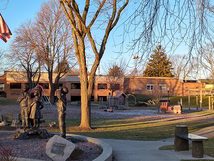 Village Square Park's bronze tribute to Elkhart Lake's heritage stands as a reminder that small towns often tell America's most compelling stories.