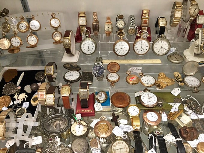 Time literally stands still in the watch display. Hundreds of timepieces, each one waiting to tell you exactly how late you are.