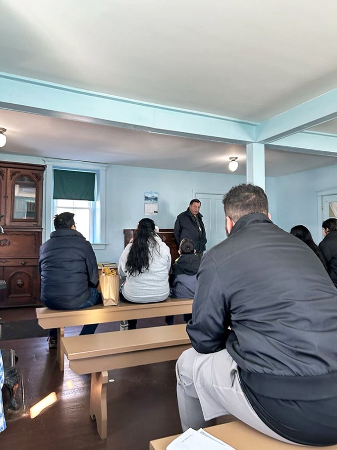 Inside the schoolhouse, visitors listen attentively as tour guides share insights about Amish education—where graduation doesn't require student loans.