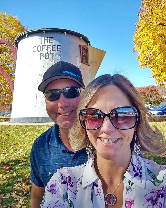 Visitors capturing the obligatory "I was here" photo. Some attractions are worth the detour—and the inevitable social media humble-brag.
