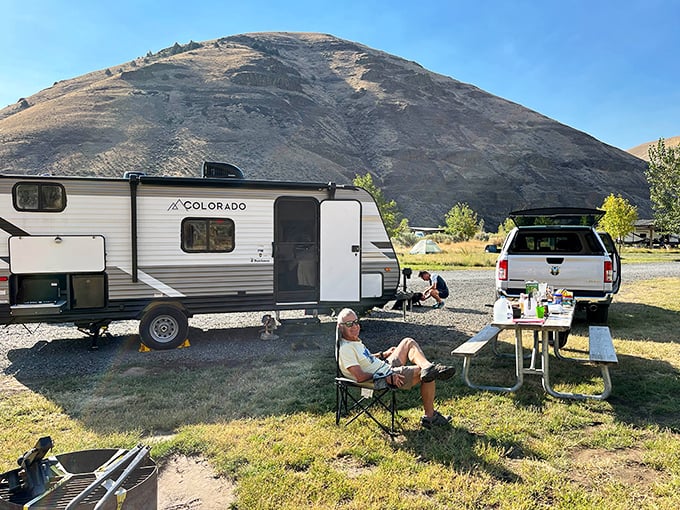 The ultimate backyard setup—where your morning coffee comes with canyon views that make resort vacations seem overpriced.