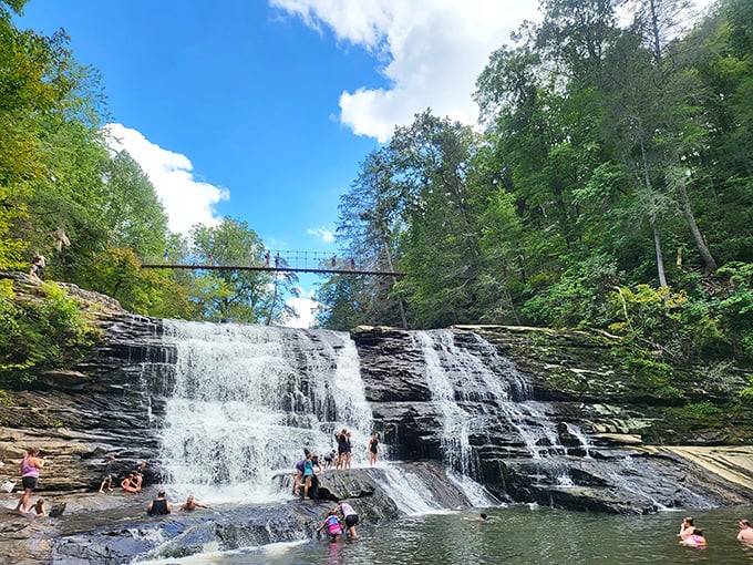 Summer's unofficial community center – where strangers become friends over shared squeals as they navigate the refreshingly cool cascades of Cane Creek.