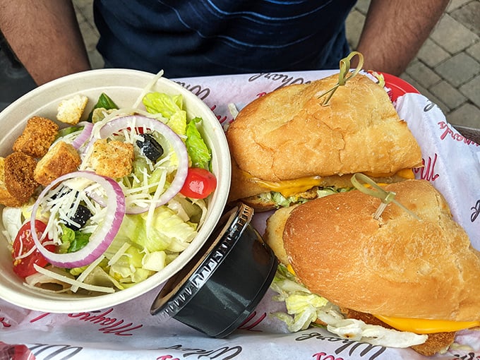 A perfect marriage: crispy walleye sandwich meets fresh salad. This is what Minnesota lunch dreams are made of.