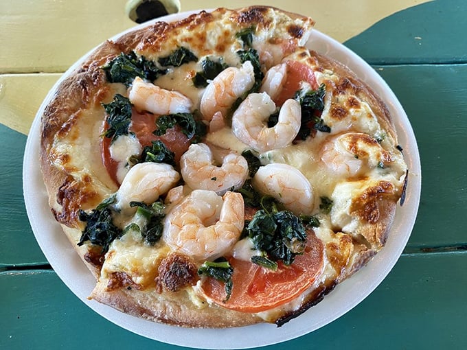 A pizza that captures the essence of the Keys—plump shrimp and fresh spinach on a canvas of melted cheese perfection.