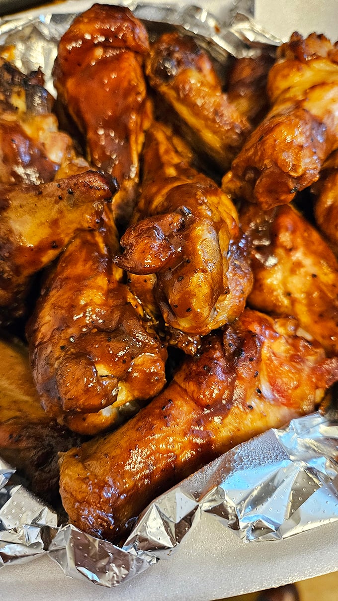 These wings aren't just smoked, they're transformed. Glistening with sauce and packed with flavor, they're the kind that make you forget napkins exist until it's too late.