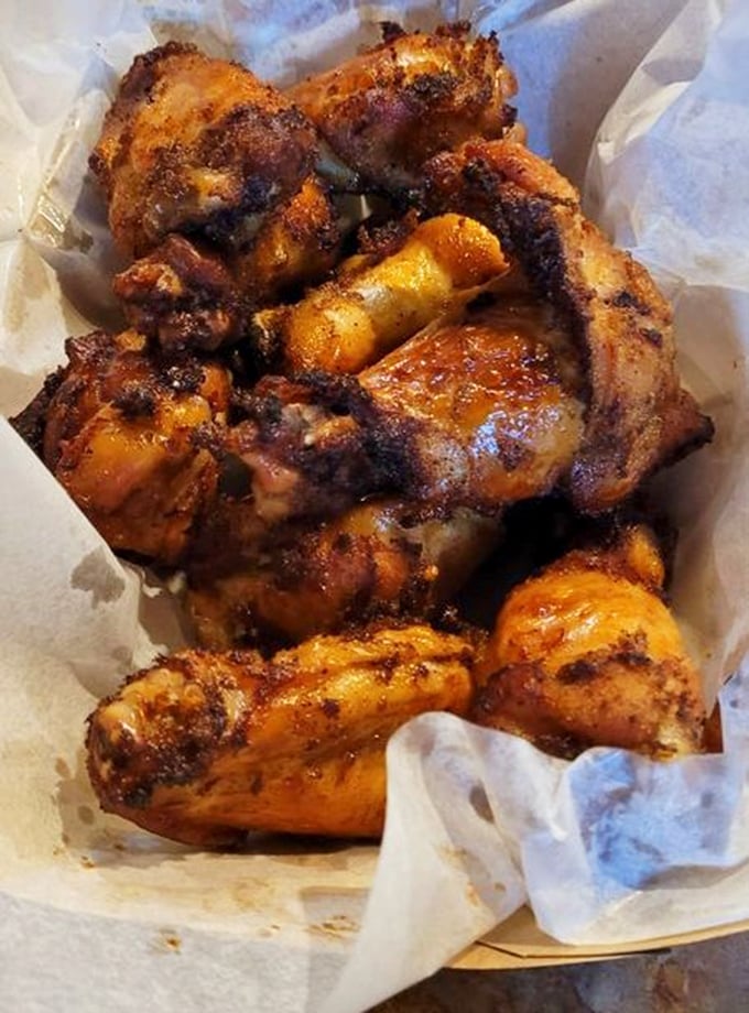 These aren't just wings; they're a masterclass in smoke and spice. The kind that make you close your eyes and forget table manners.